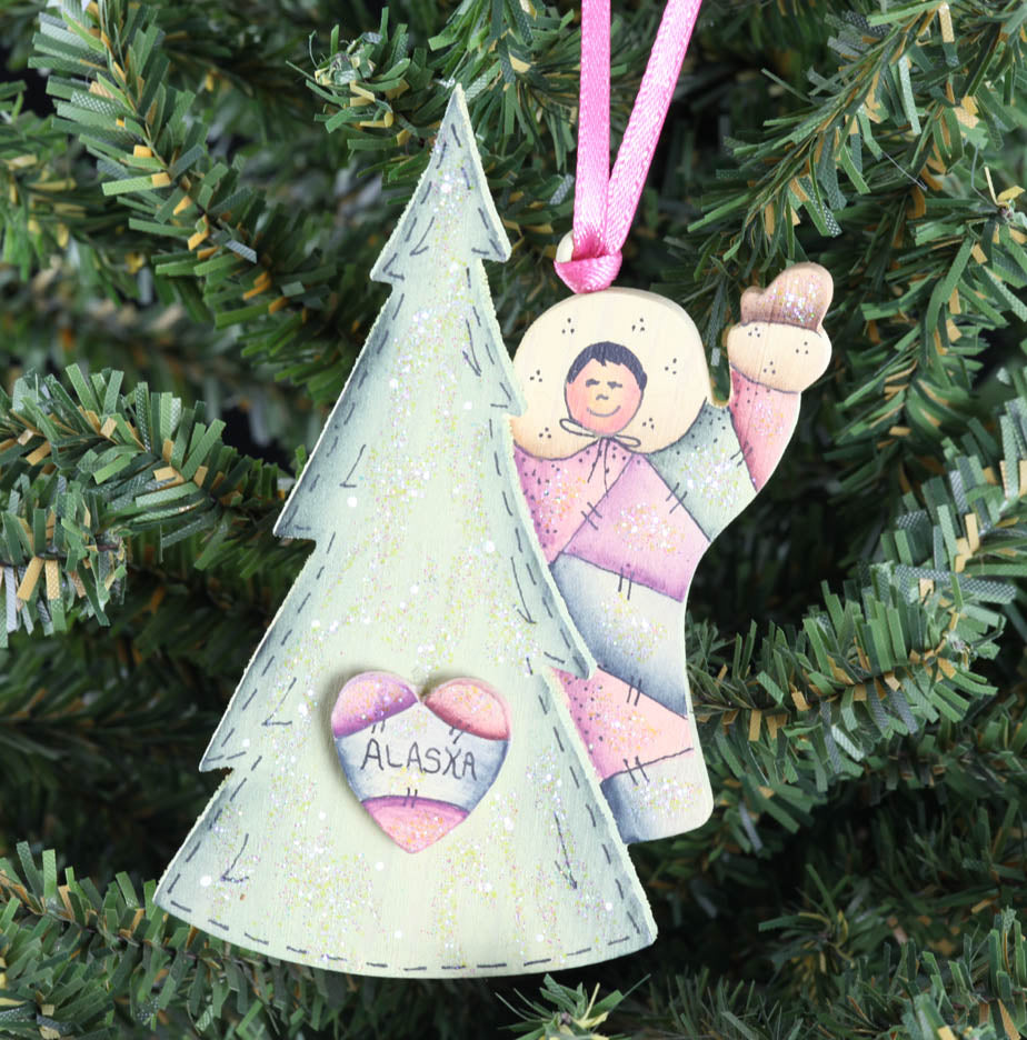 Eskimo behind a tree – Fish Creek Company